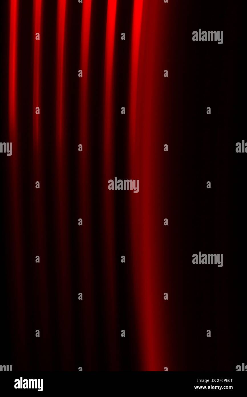red light lines on a black background Stock Photo - Alamy