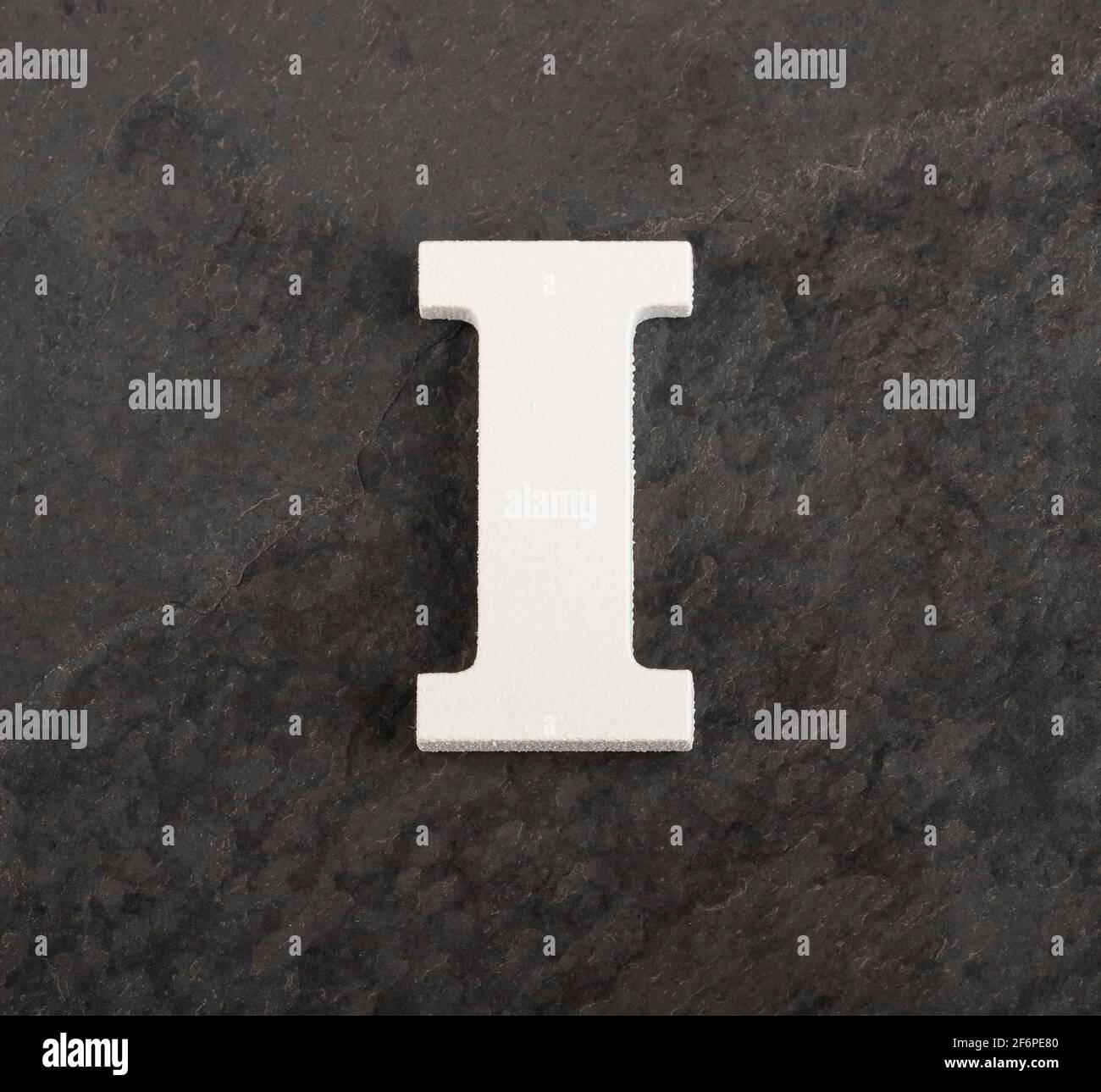 Letter I from blank alphabet on gray background Stock Photo - Alamy