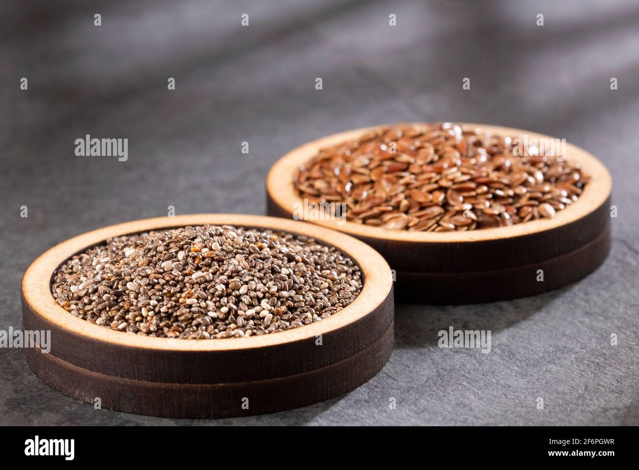 Organic chia and linseed seeds Stock Photo - Alamy