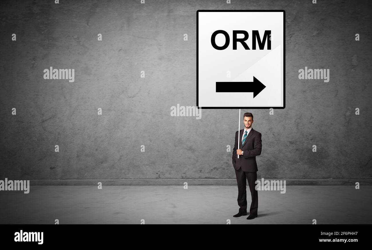 business person holding a traffic sign Stock Photo - Alamy