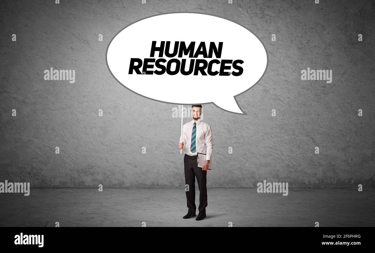 business person in casual holding road sign Stock Photo - Alamy