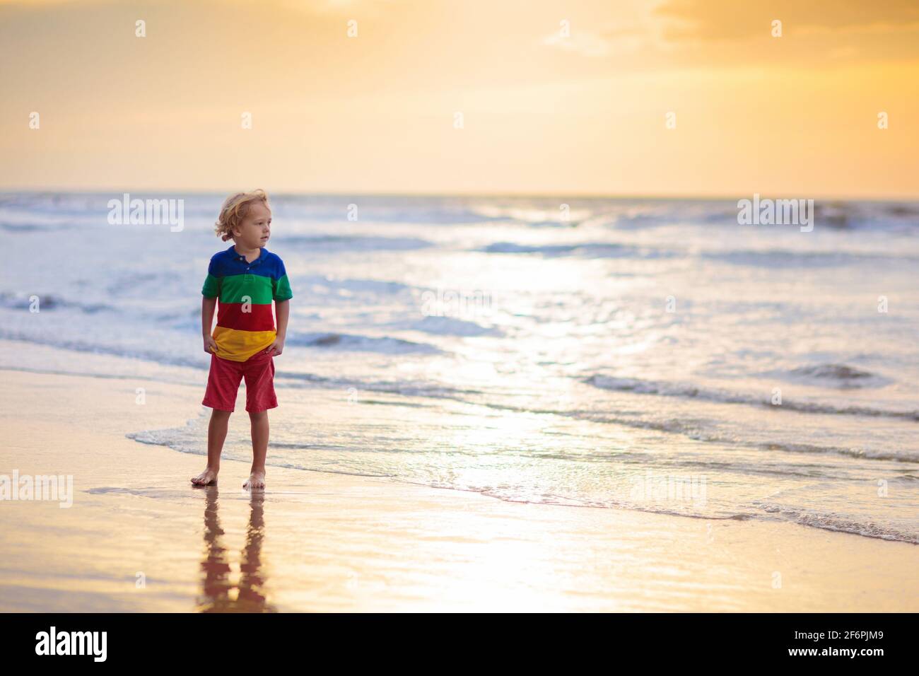 Child Playing In The Waves High Resolution Stock Photography and Images ...