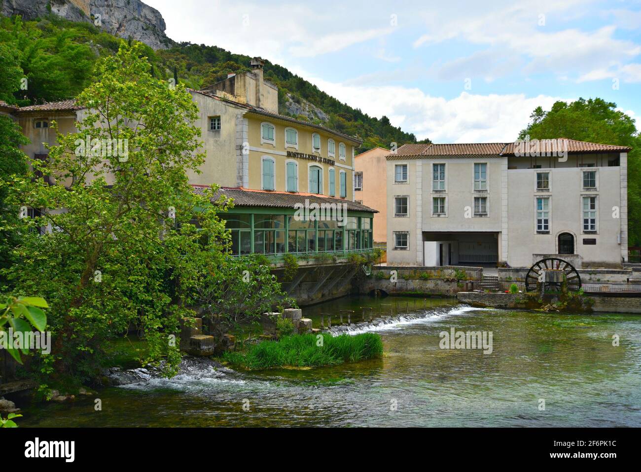 Scenic landscape with view of Fontaine de Vaucluse a village on the ...