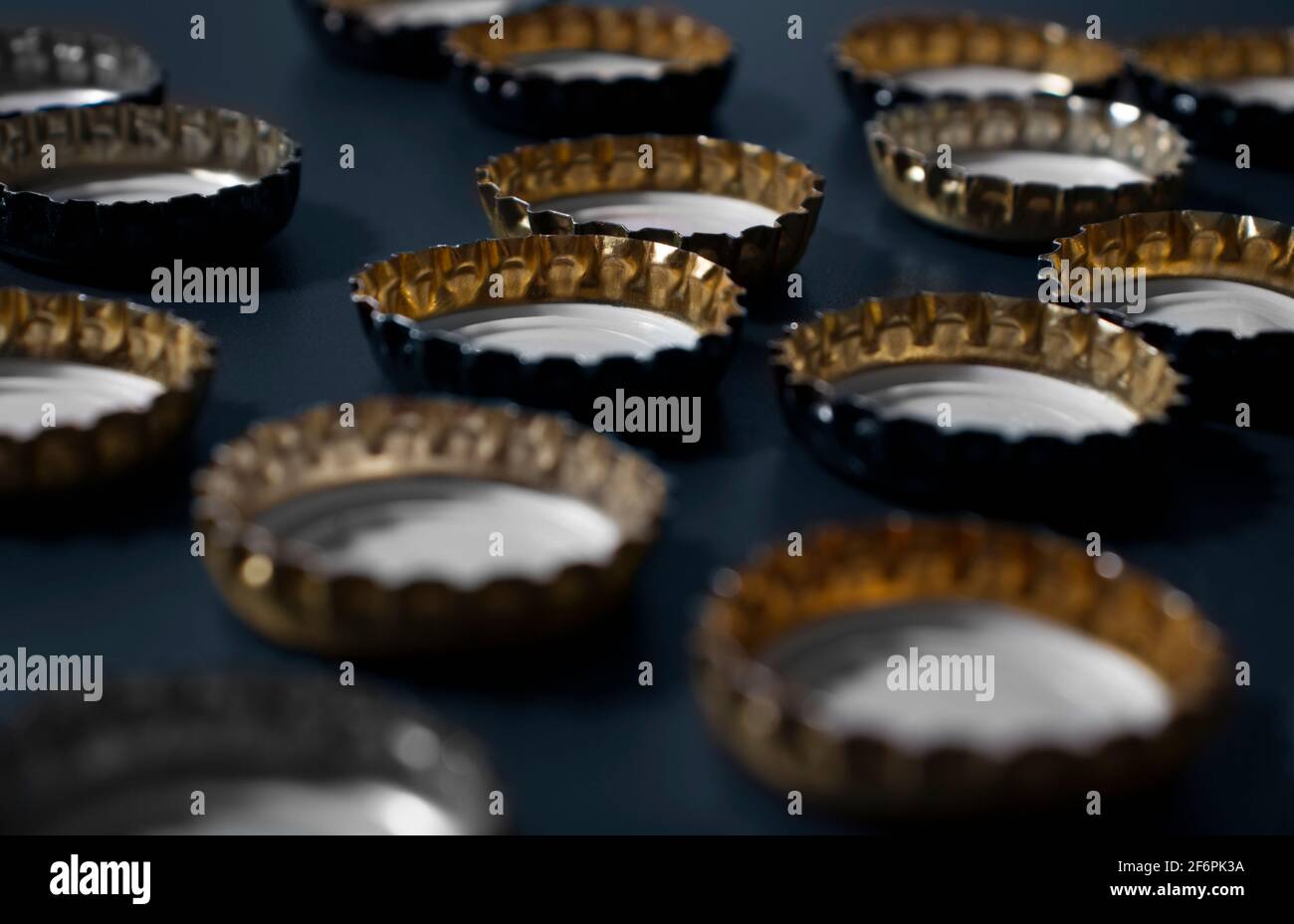 beer lids on a dark surface Stock Photo - Alamy
