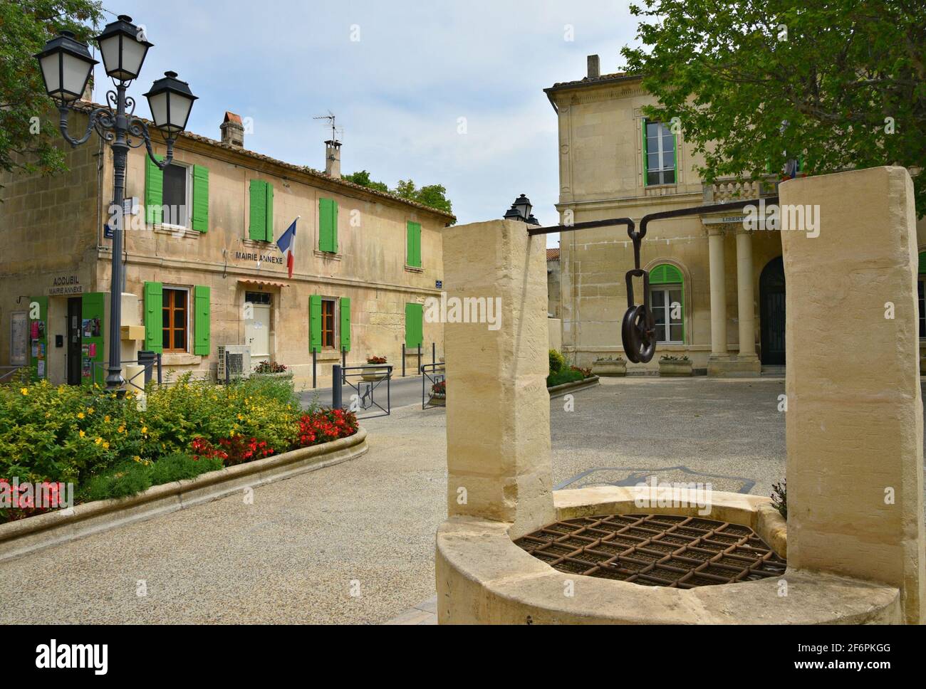 Provençal style architecture with an old quarry water well in the ...