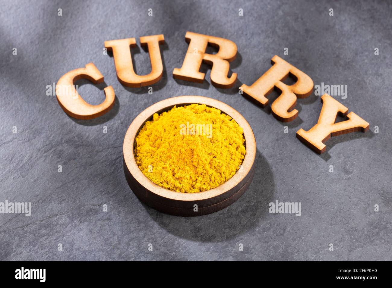 Organic curry powder - Text space Stock Photo - Alamy