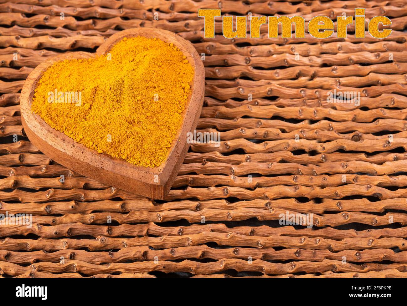 Organic Turmeric Powder in Heart Shaped Bowl - Curcuma longa Stock ...