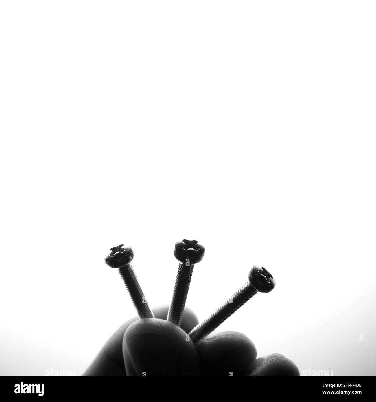 Screws in hand hi-res stock photography and images - Alamy