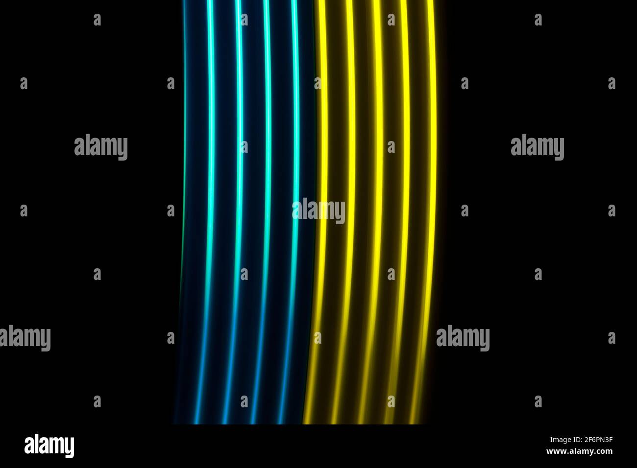 Yellow and blue light dynamics lines on a black background Stock Photo ...