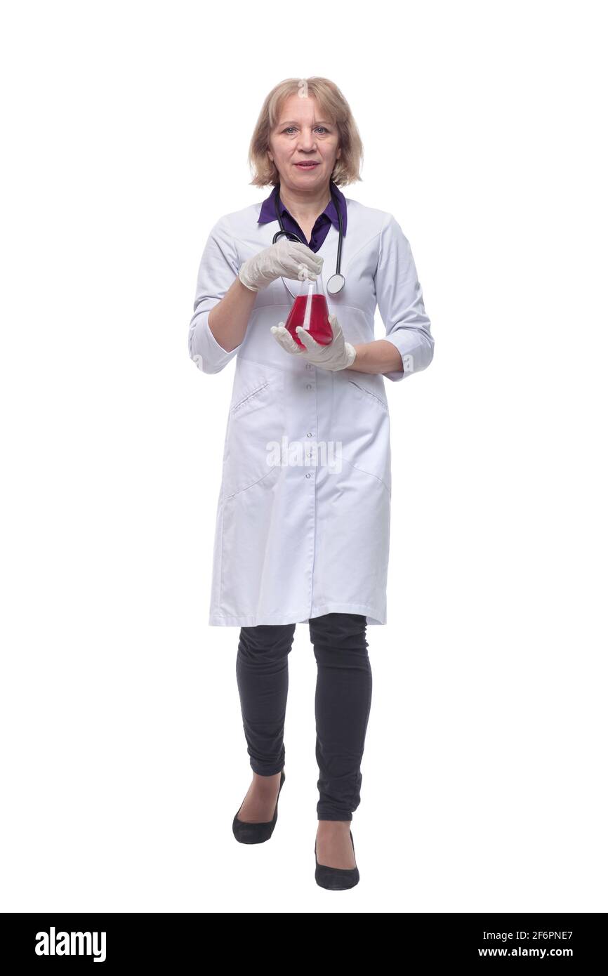 Scientist holding up beaker of chemical Stock Photo - Alamy