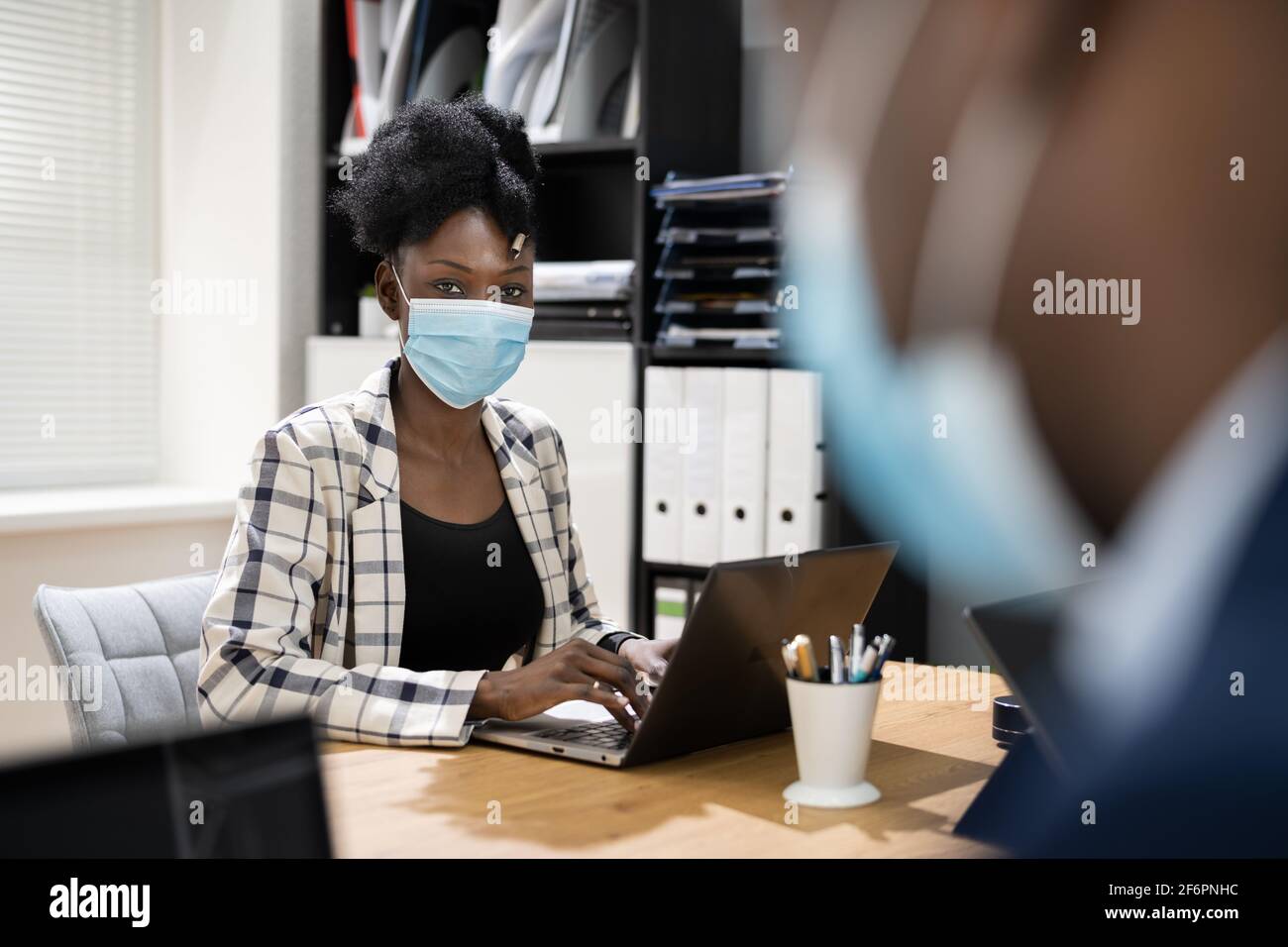 Covid 19 mask team hi-res stock photography and images - Alamy