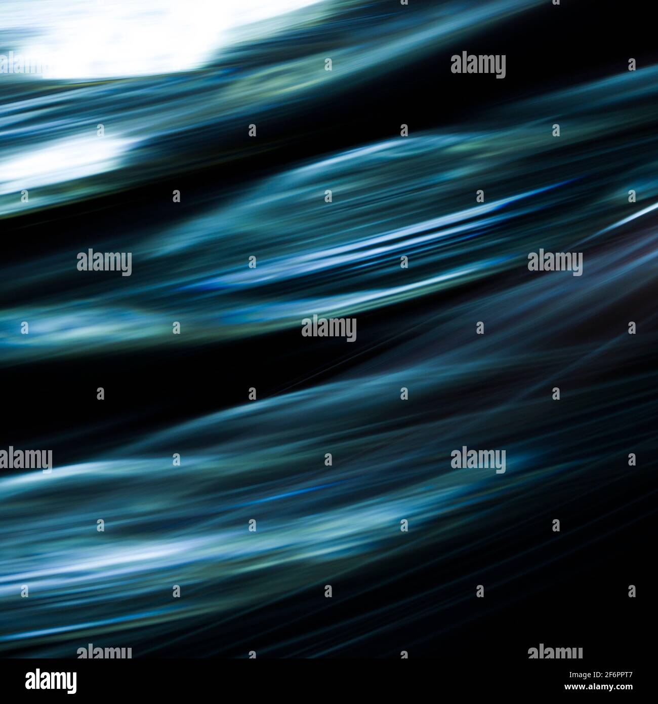 Blue light curve lines on a black background Stock Photo - Alamy