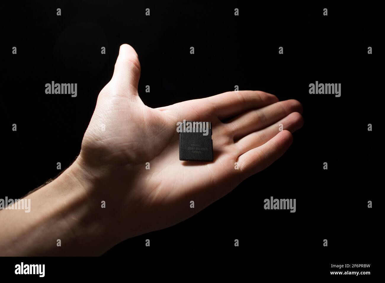 Sd memory card hand hi-res stock photography and images - Alamy