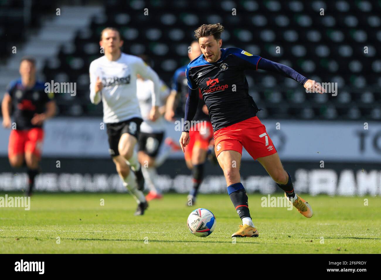 Derby, UK. 02nd Apr, 2021. Harry Cornick #7 of Luton Town runs with the ...
