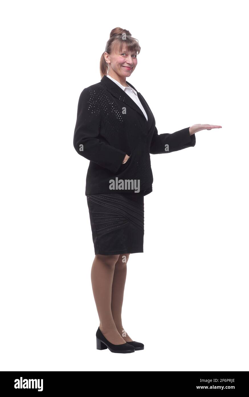 Full length, side view of a confident young business woman standing ...