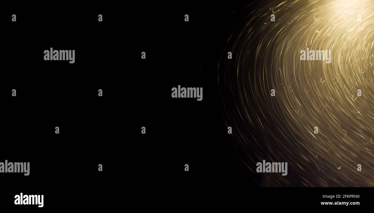 copper light particles in a circular rotation Stock Photo - Alamy