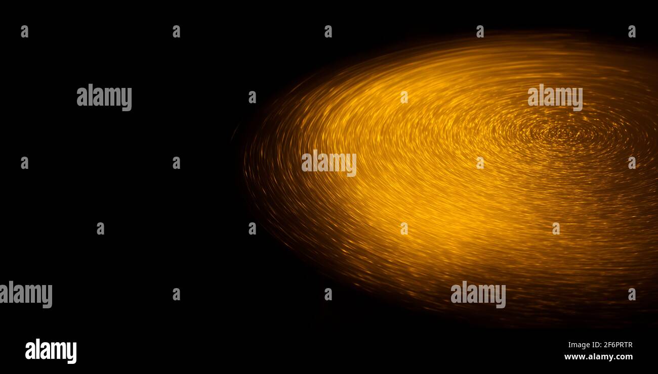 gold and yellow light particles in a circular rotation Stock Photo - Alamy