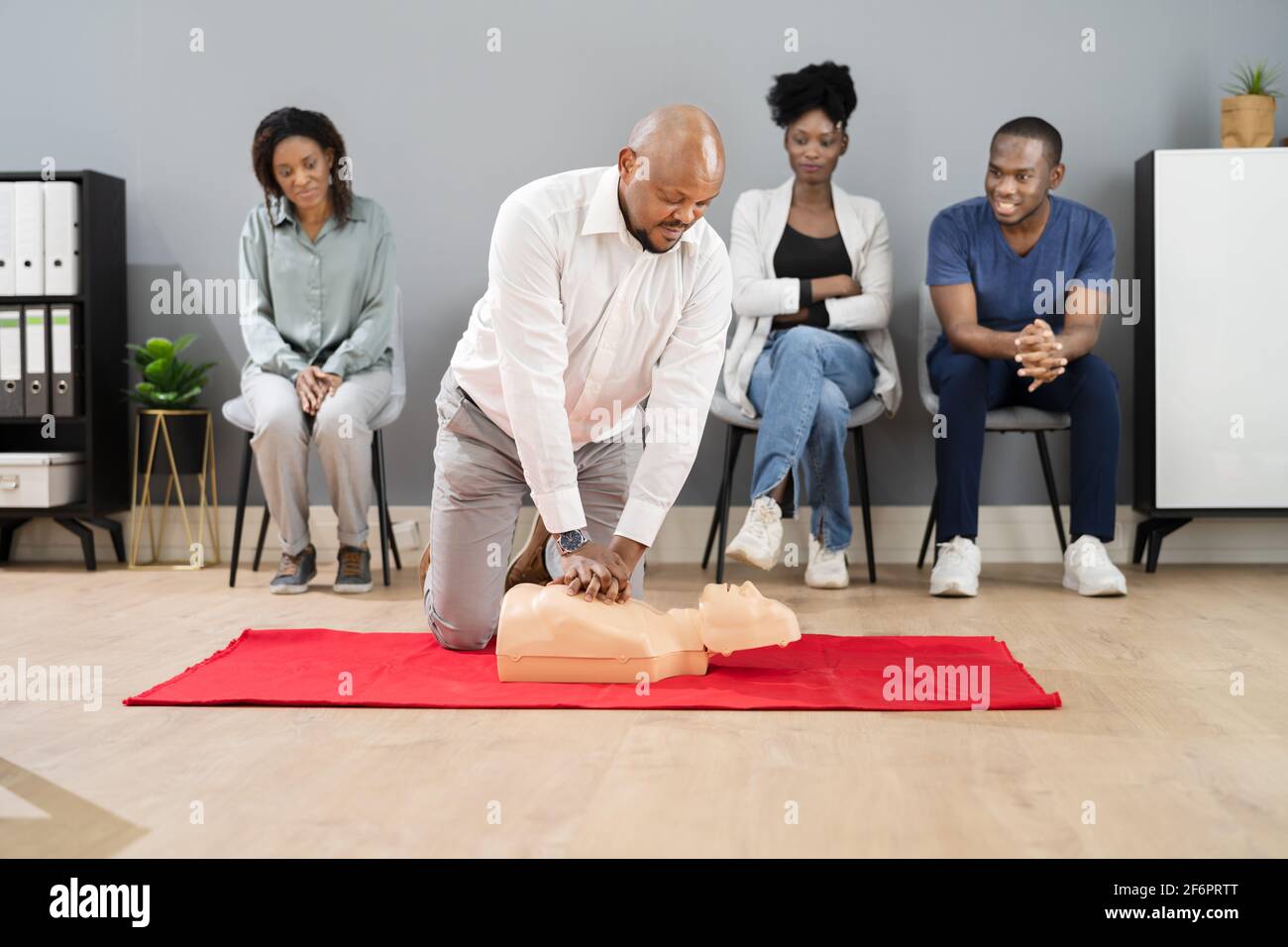 CPR First Aid Lifeguard Or Paramedic Class With African Students Stock ...