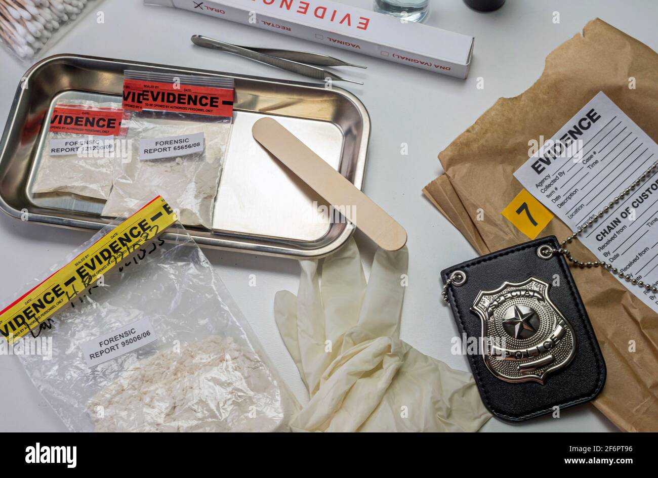 Drug bag next to police badge in crime lab, concept image Stock Photo ...