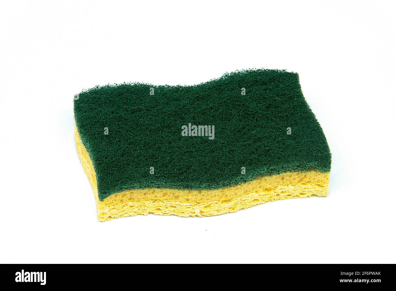 sponge with a scraper on a white background Stock Photo - Alamy
