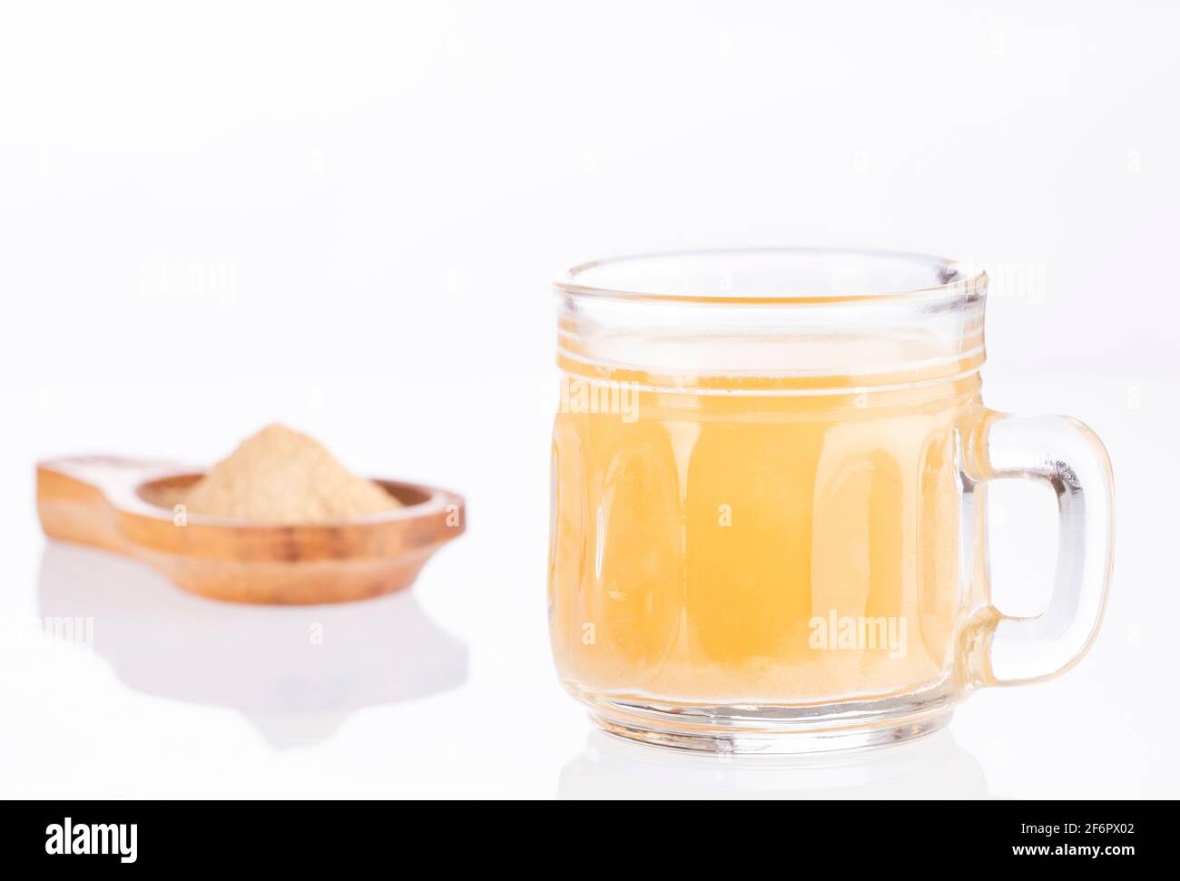 Maca root health drink in a glass with powdered - Lepidium meyenii ...