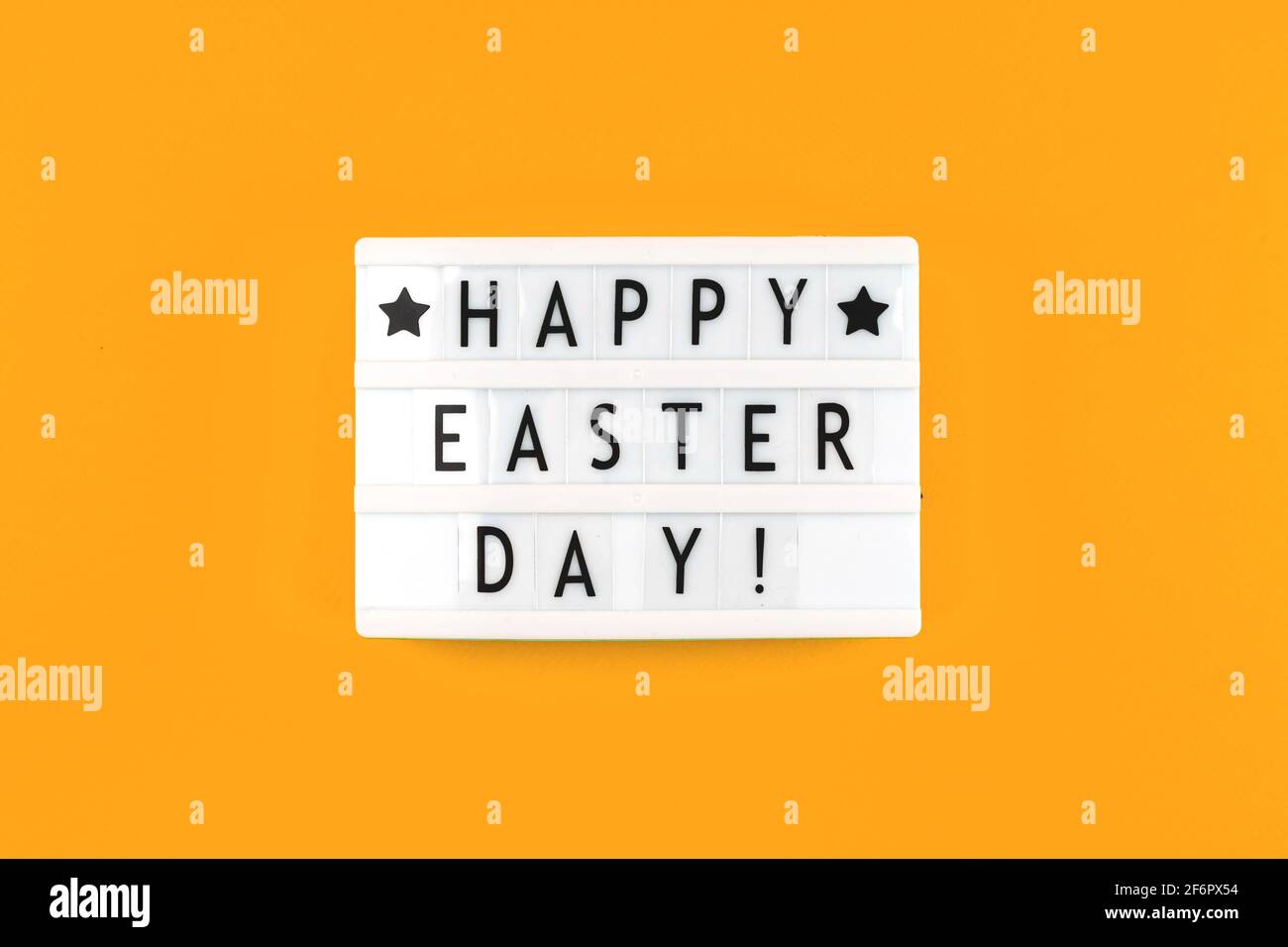 Happy Easter Day text message on a lightbox, greeting card concept ...