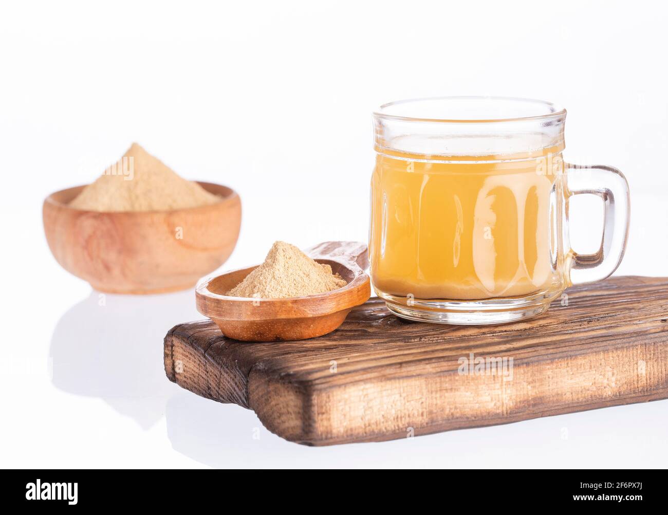 Maca root health drink in a glass with powdered - Lepidium meyenii ...