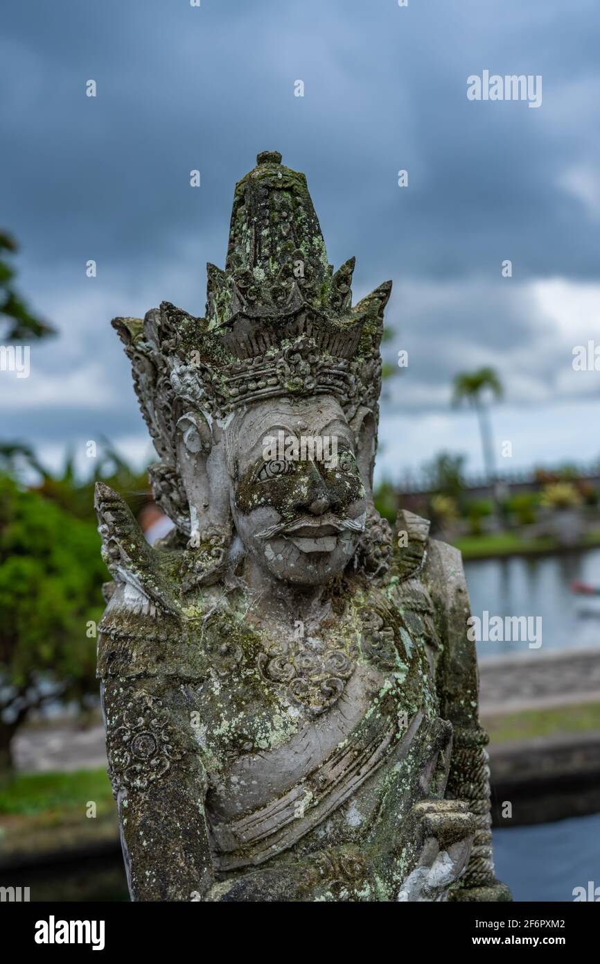 Statue at the Tirta Gangga palace in Bali Indonesia Stock Photo - Alamy