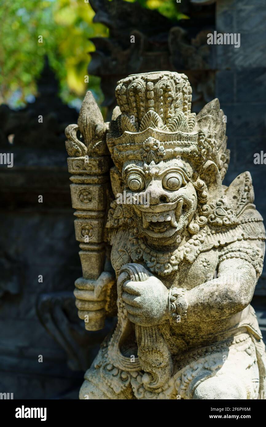 Ancient Balinese statue at the temple in Bali Indonesia Stock Photo - Alamy