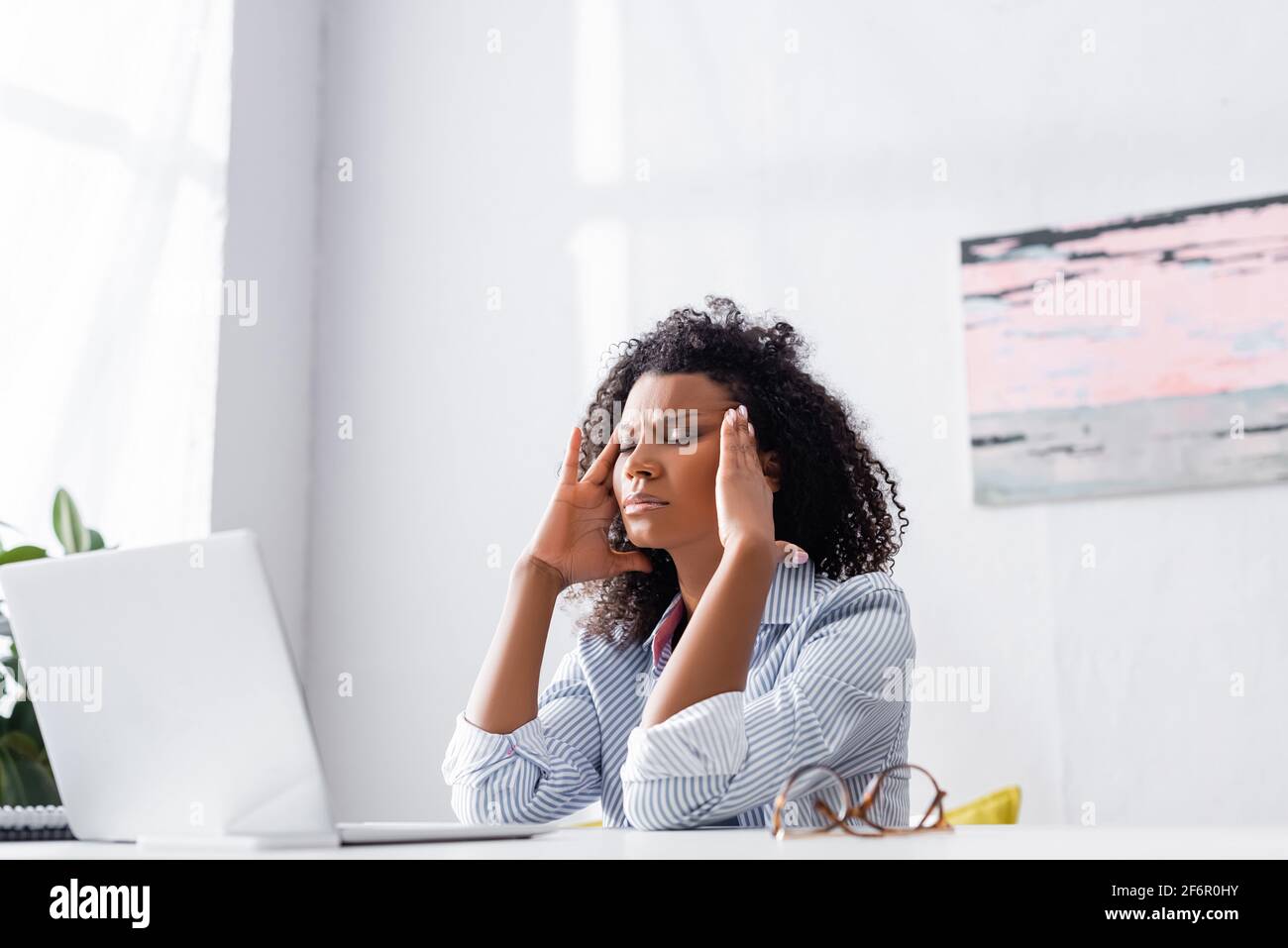 African american teleworker suffering hi-res stock photography and ...