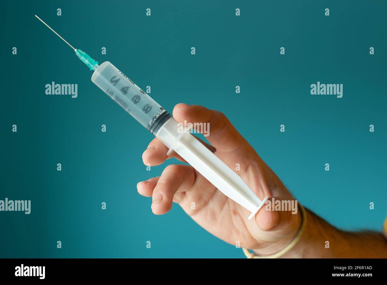 Male doctor handling syringe patient hi-res stock photography and ...
