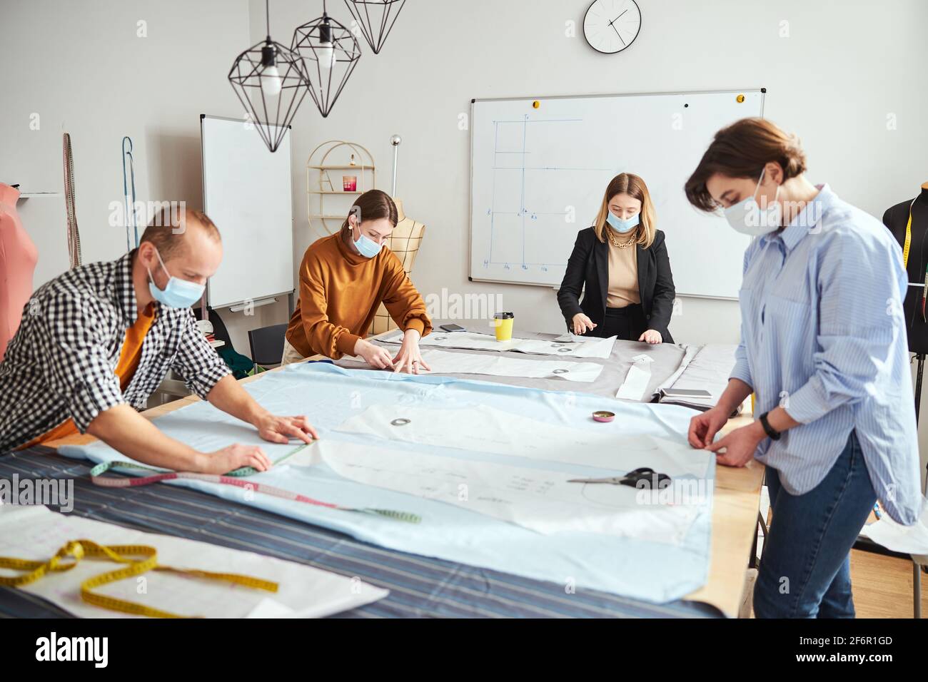 Student group is learning tailoring in classroom Stock Photo - Alamy
