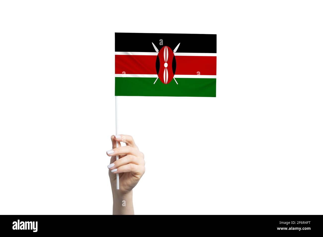 Beautiful female hand holding Kenya flag, isolated on white background ...