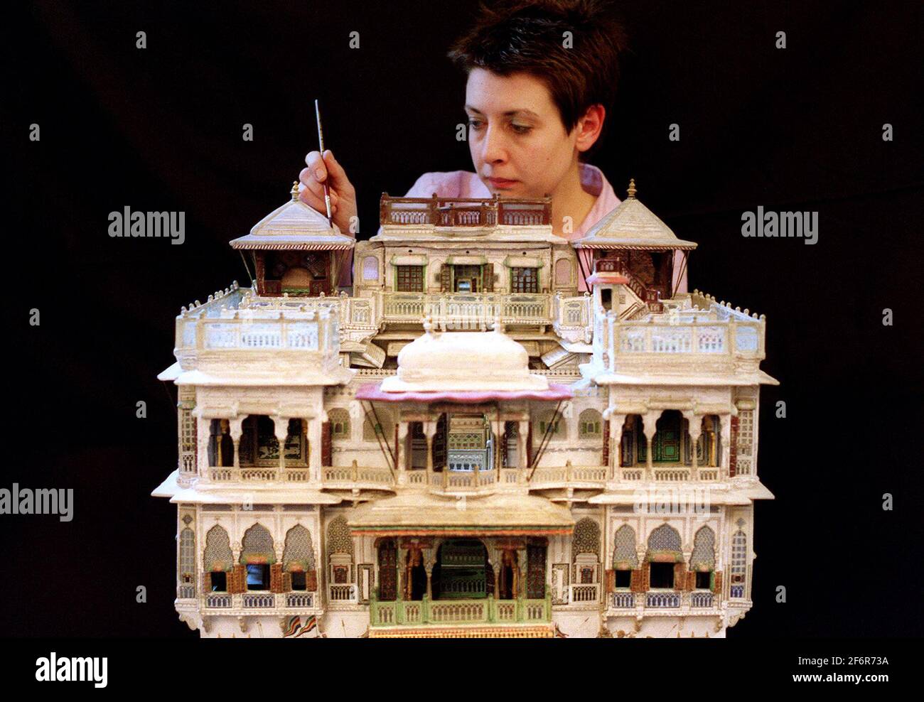 JULIA GYNN MARCH 2001 ARTISTPUTS FINISHING TOUCHES TO A MODEL OF THE ...