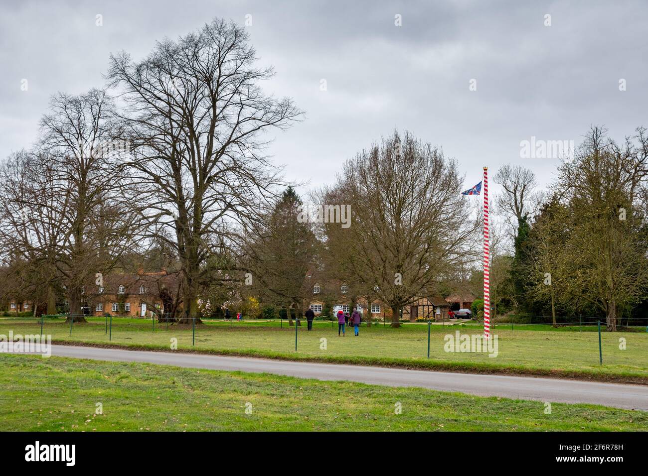 Red and white wrapped Maypole on the green in Ickwell, Bedfordshire, UK ...