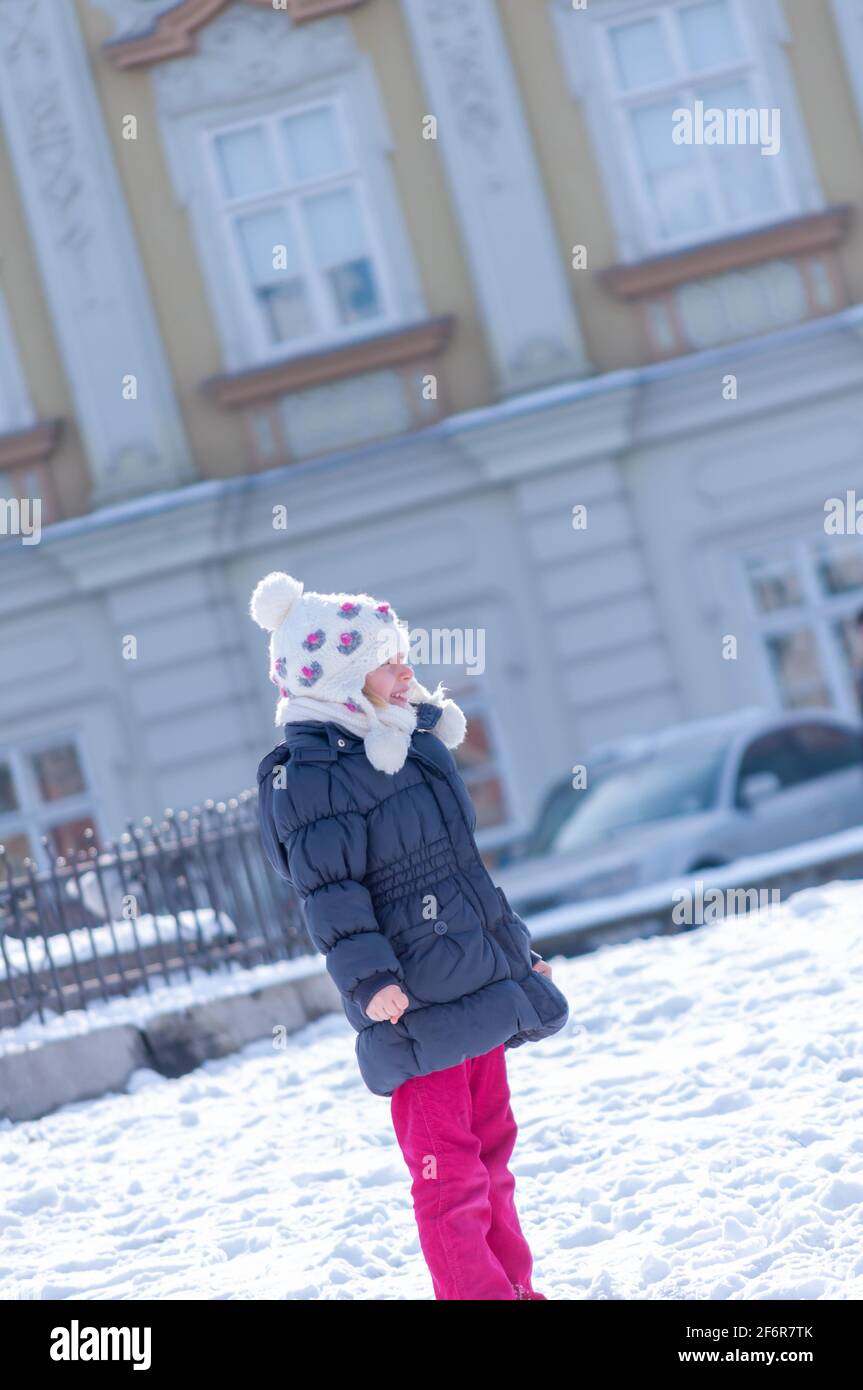 Timisoara, Romania - January 30, 2014: Kids playing with snow in the ...