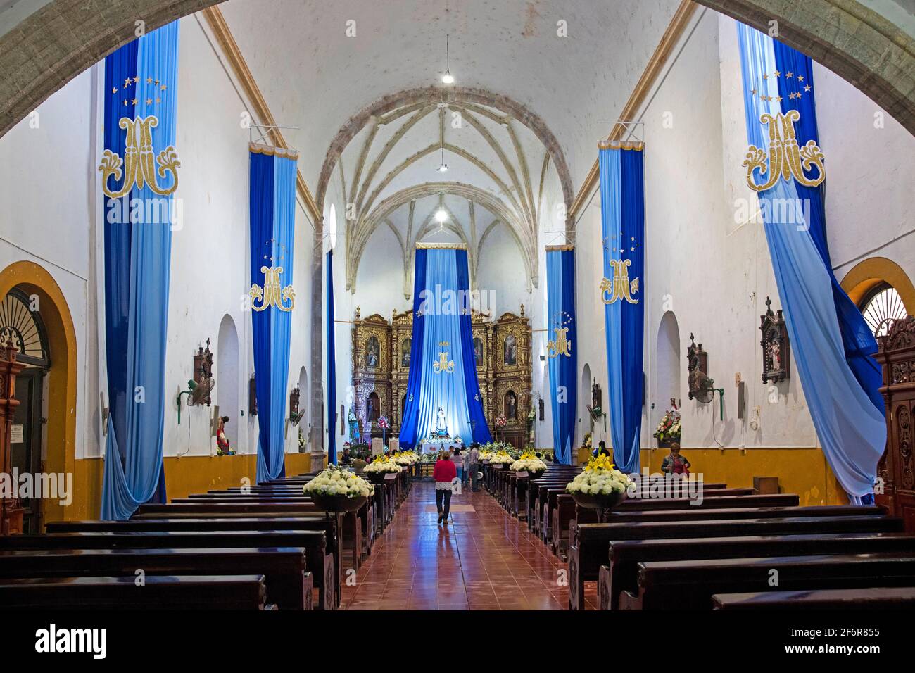 Mexicans visiting interior of the Convento de San Antonio de Padua ...