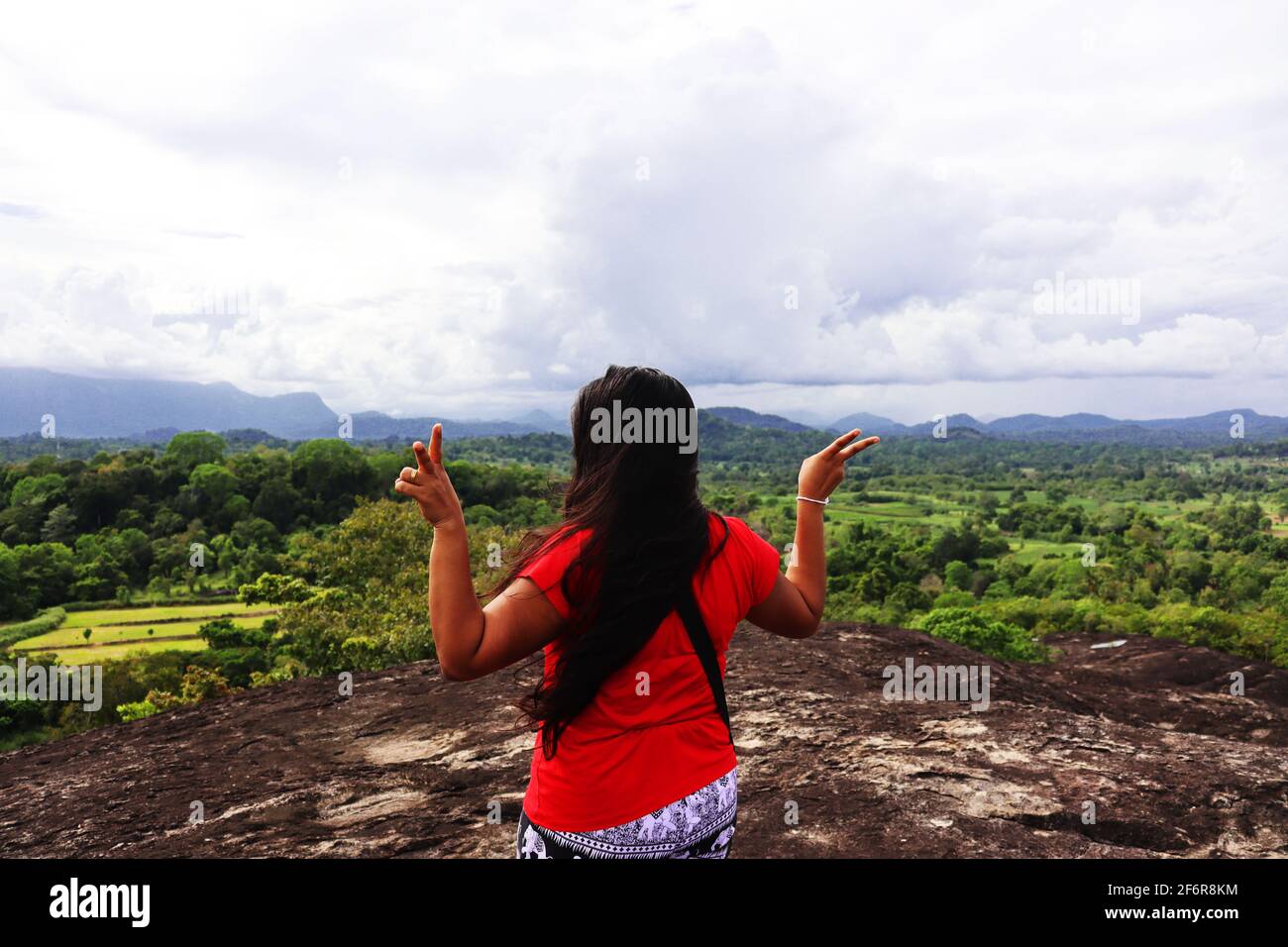 a girl looking around in the morning and thinking Stock Photo - Alamy