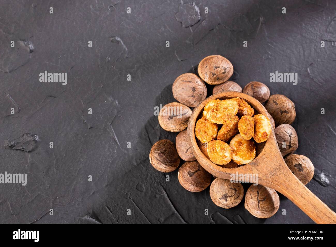 Plukenetia volubilis - Roasted sacha inchi seeds Stock Photo - Alamy