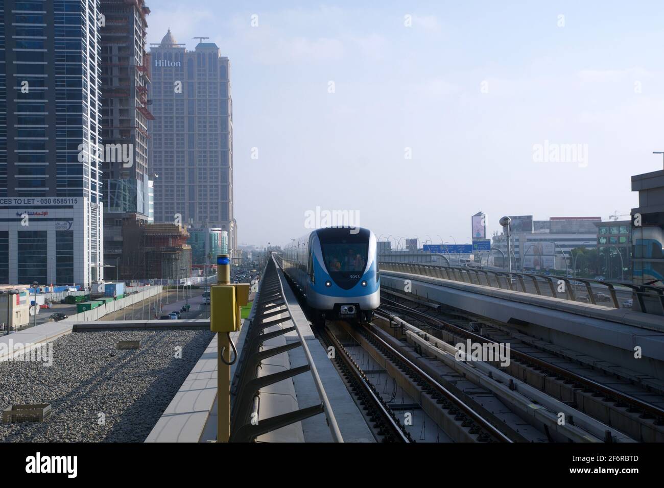 DUBAI, UNITED ARAB EMIRATES - JUN 19, 2019: Metro Dubai train with city ...