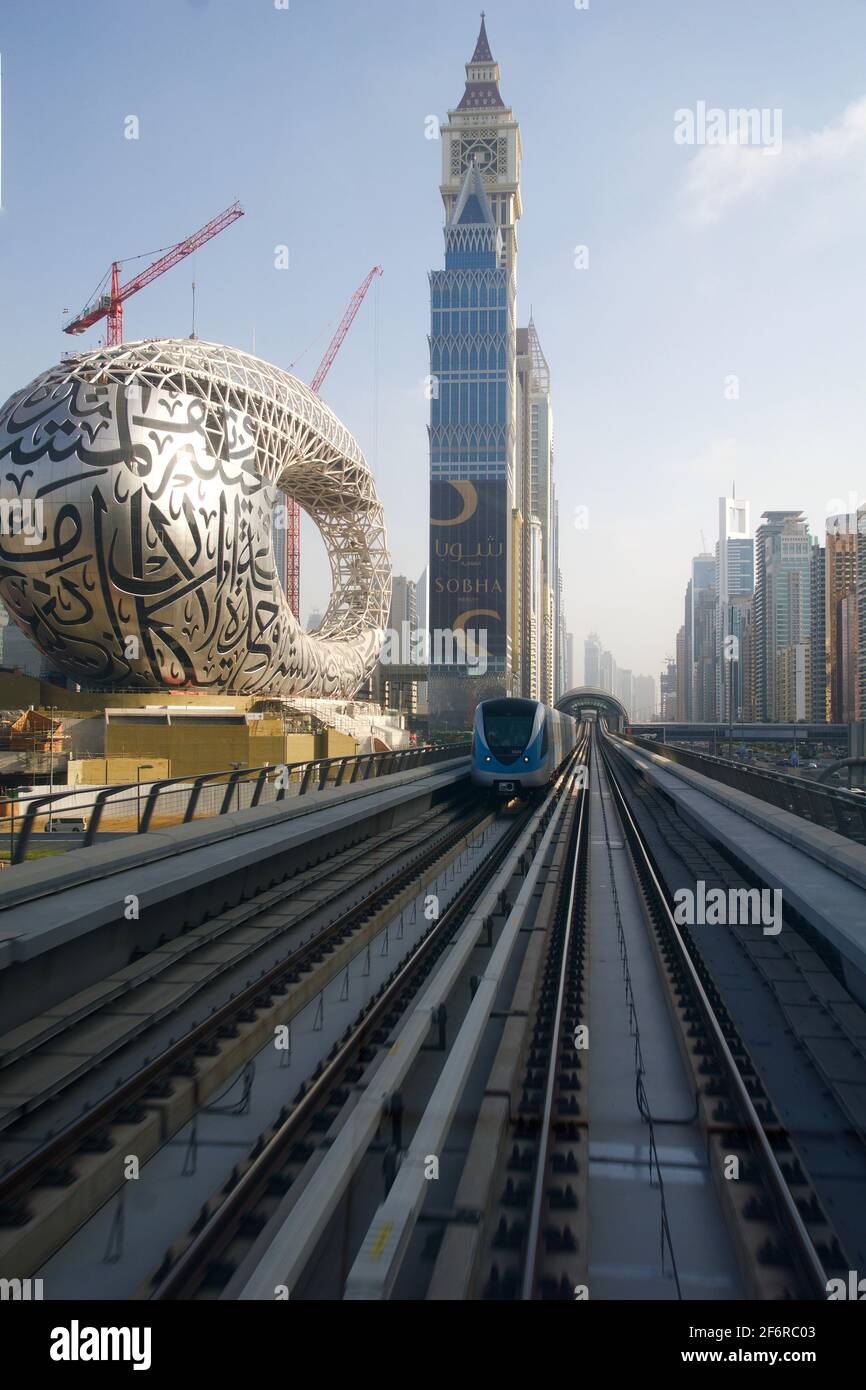 DUBAI, UNITED ARAB EMIRATES - JUN 19, 2019: Metro Dubai train with city ...