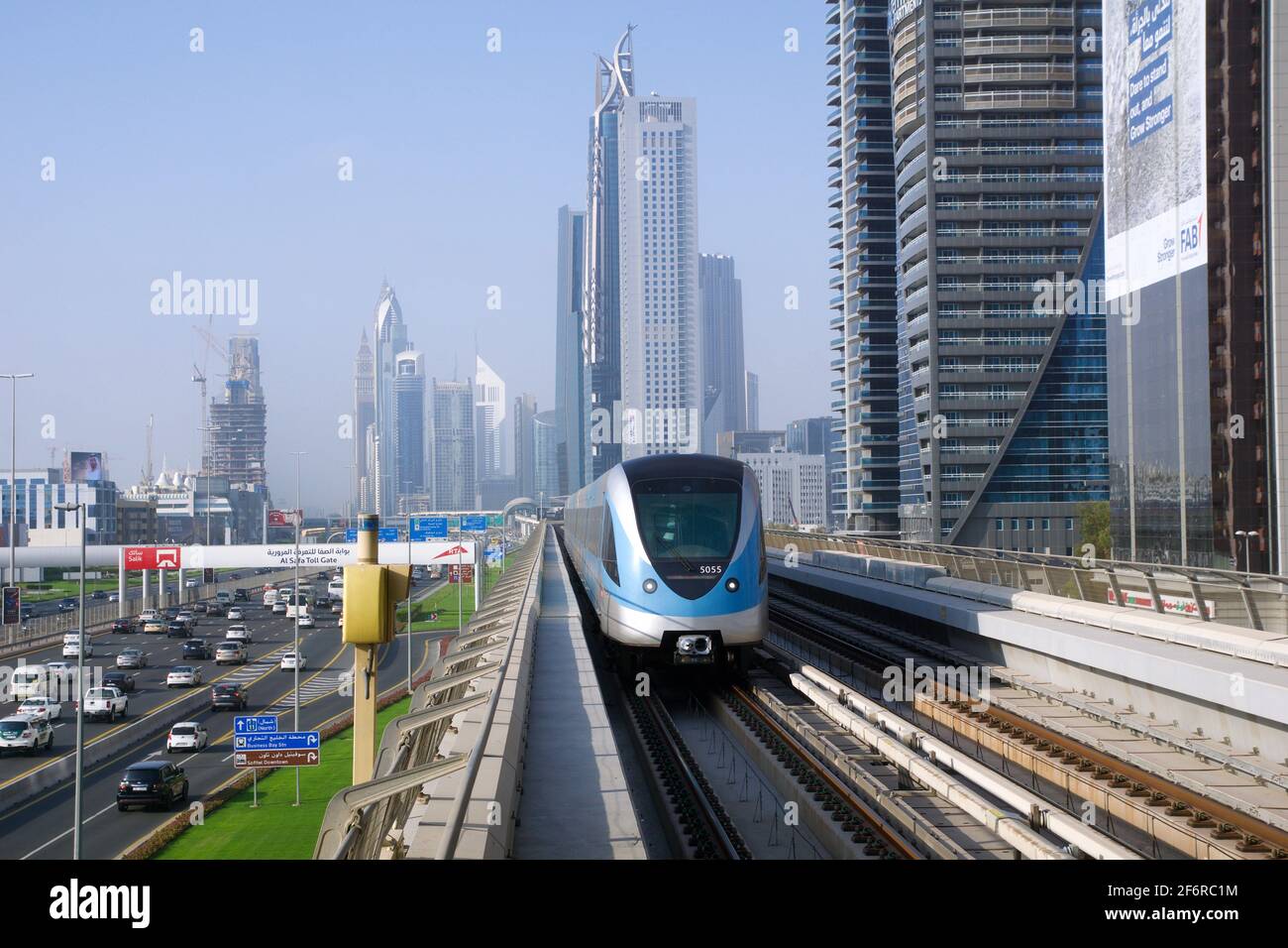 DUBAI, UNITED ARAB EMIRATES - JUN 19, 2019: Metro Dubai train with city ...