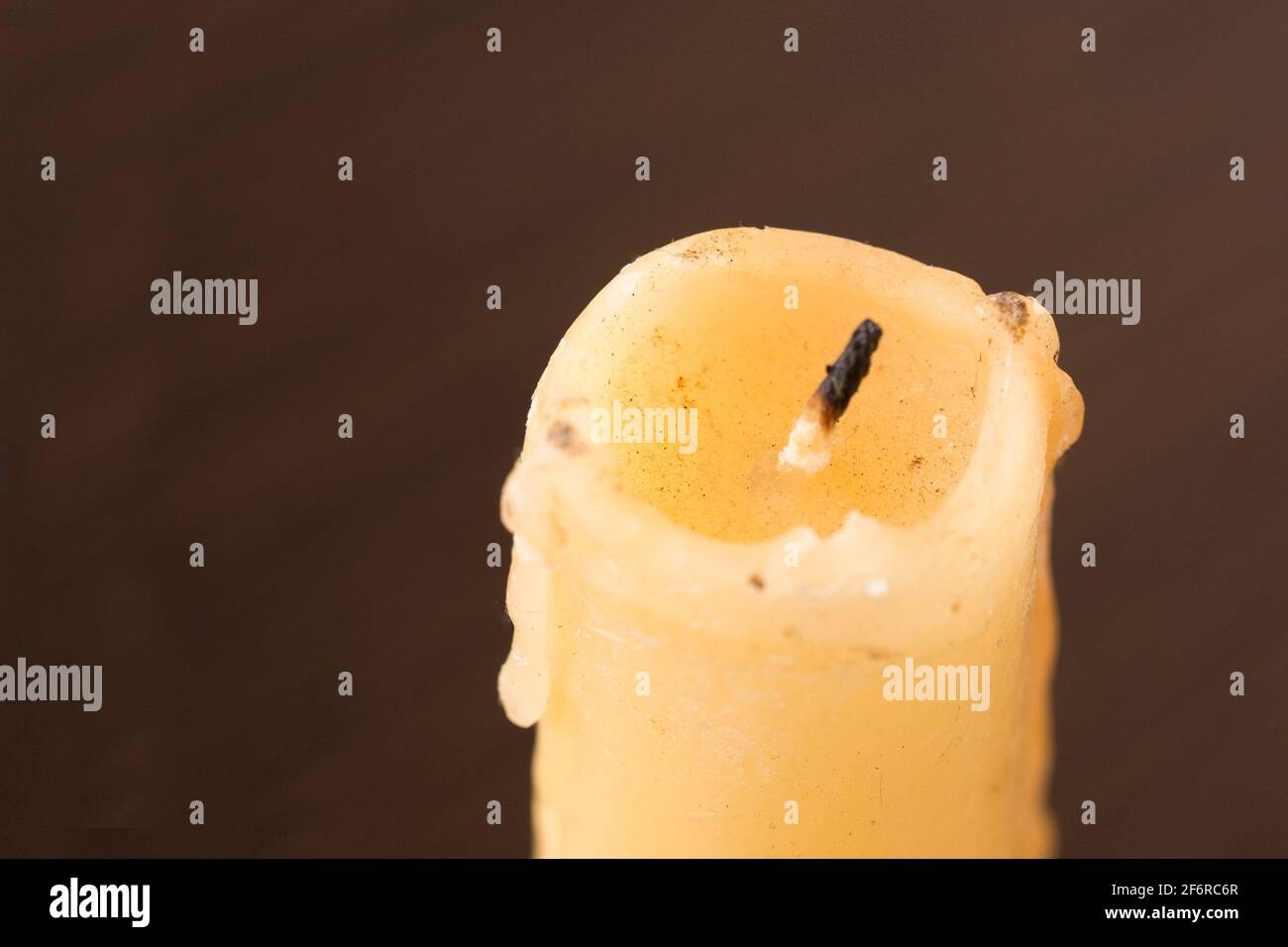 Extinguished candle on dark background with copy space Stock Photo - Alamy