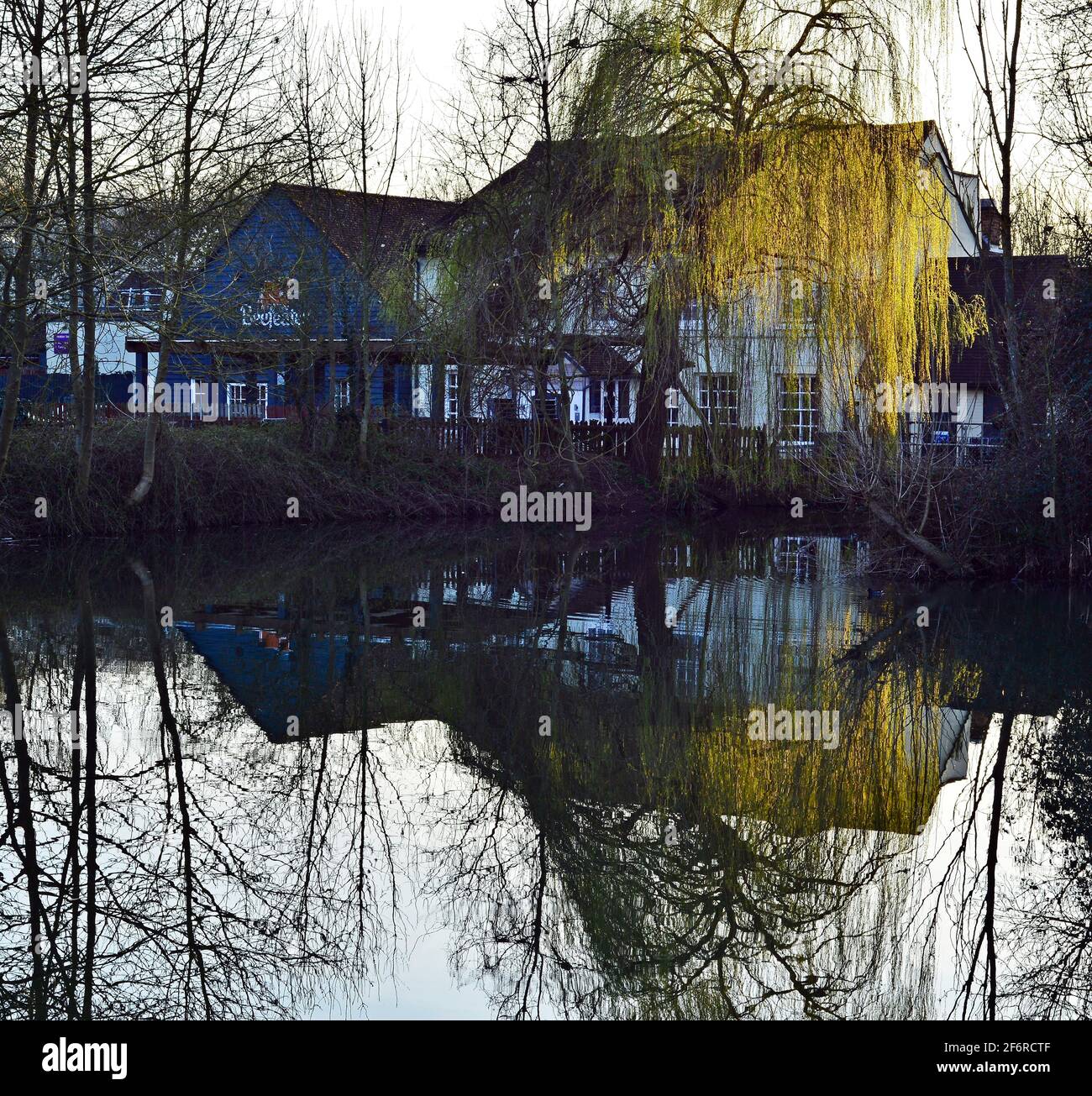 Reflection of building on water Stock Photo - Alamy