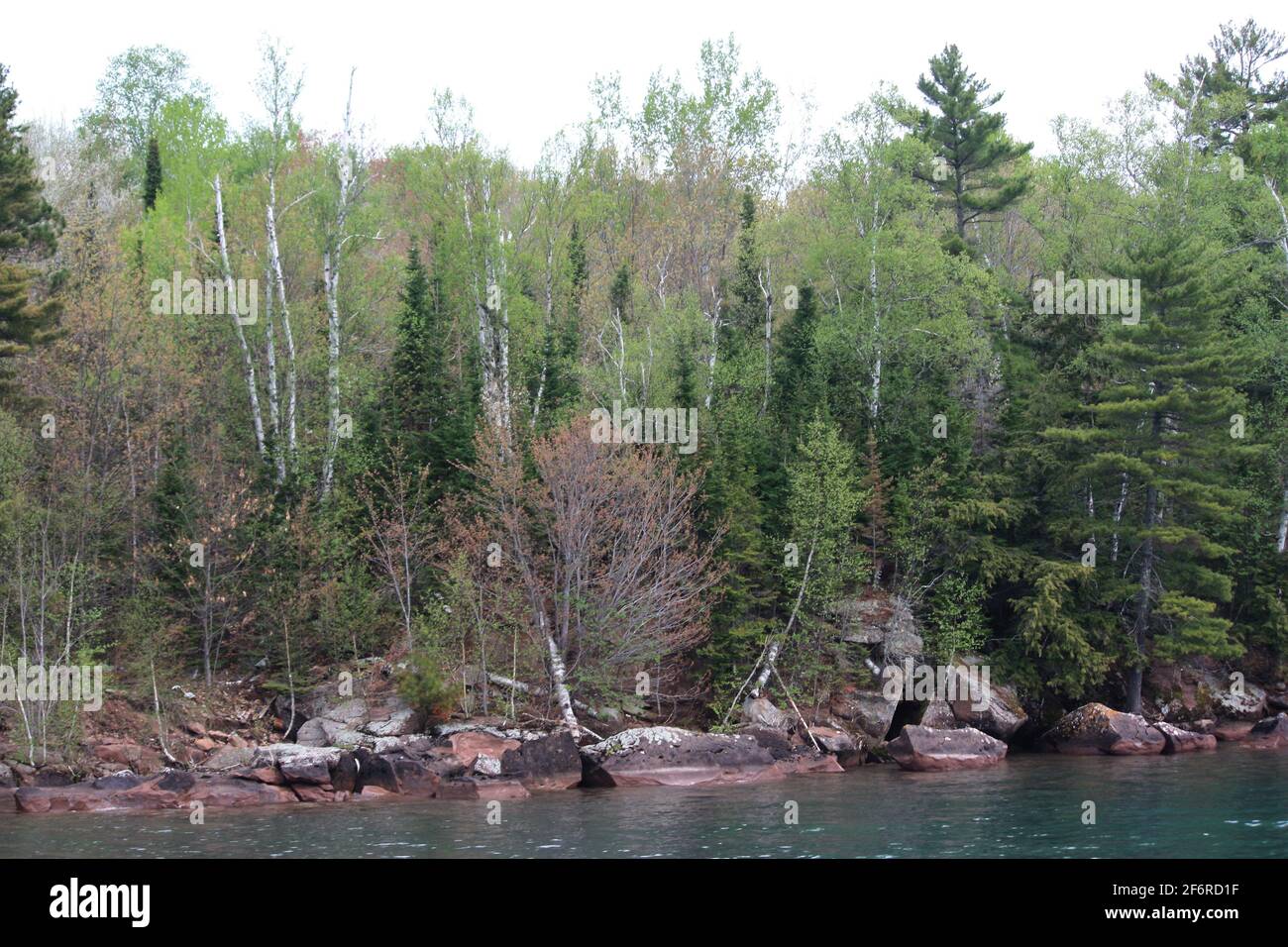 The Lake Superior shoreline in Bayfield, Wisconsin, lined with ...