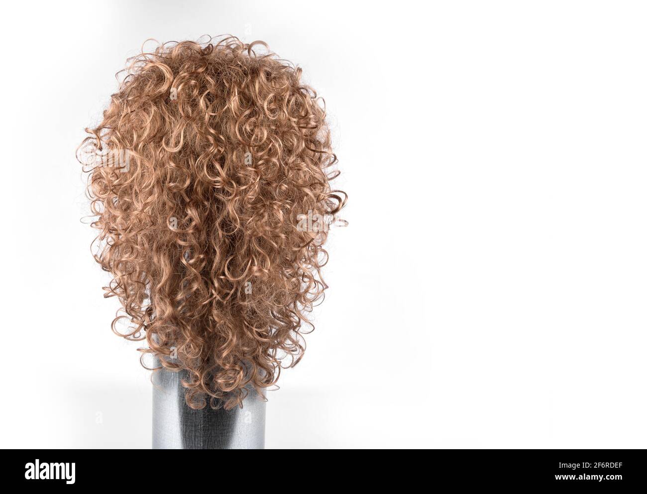 Curly hair wig on a white background Stock Photo - Alamy