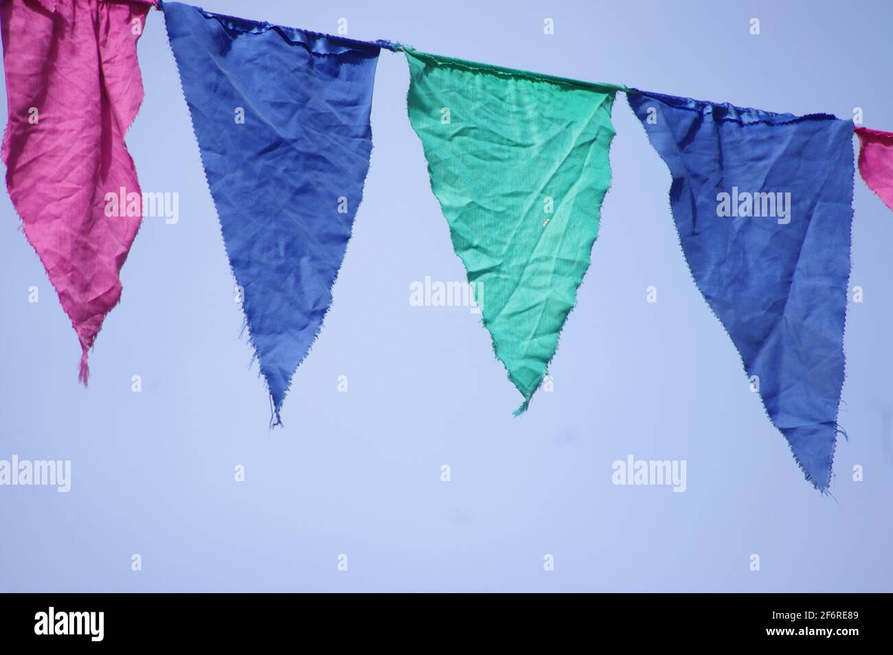 colorful pennants blue sky Stock Photo - Alamy