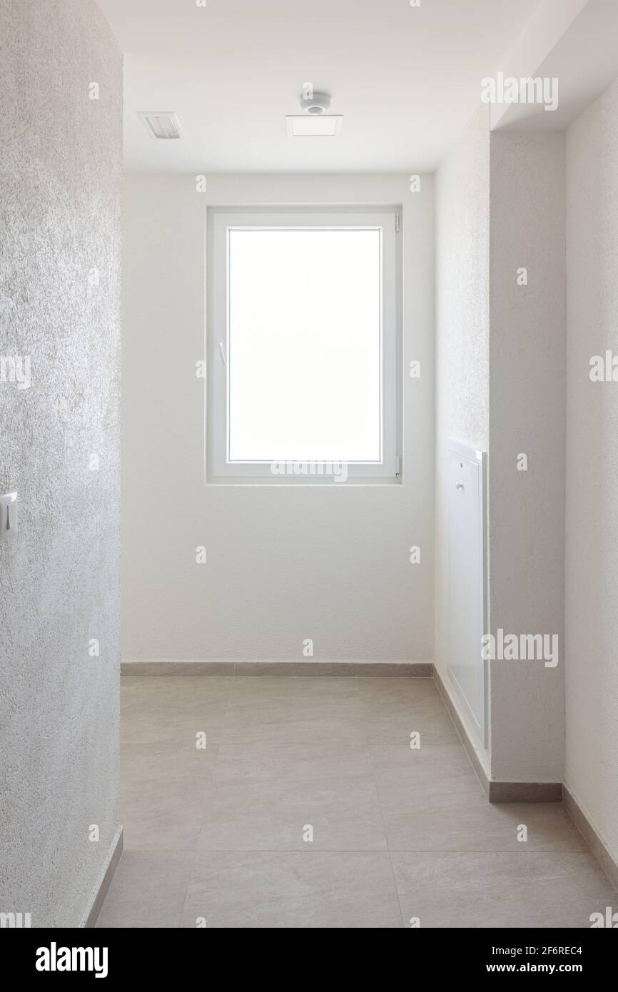 hallway in the building, white walls and windows Stock Photo - Alamy