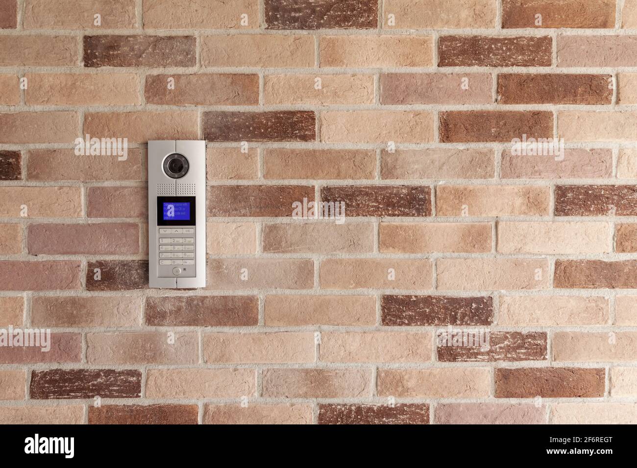 intercom with camera on brick wall, close up and copy space Stock Photo ...