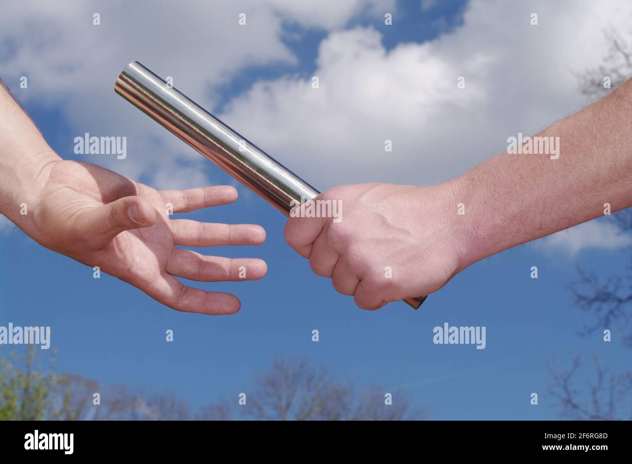 Relay race exchange baton hi-res stock photography and images - Alamy
